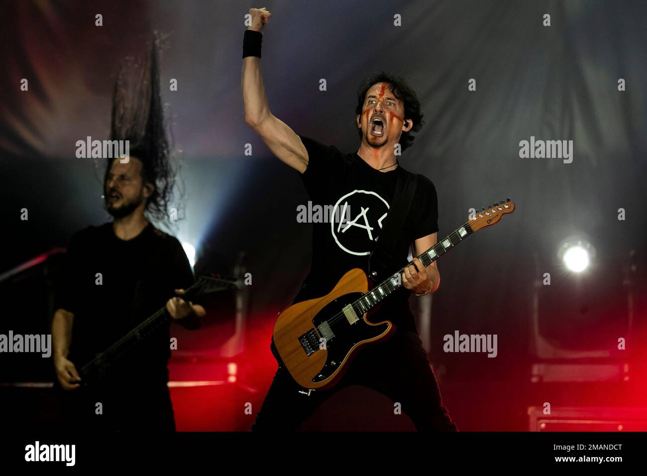 Vocalist and guitarist Joe Duplantier, center, of the French ...