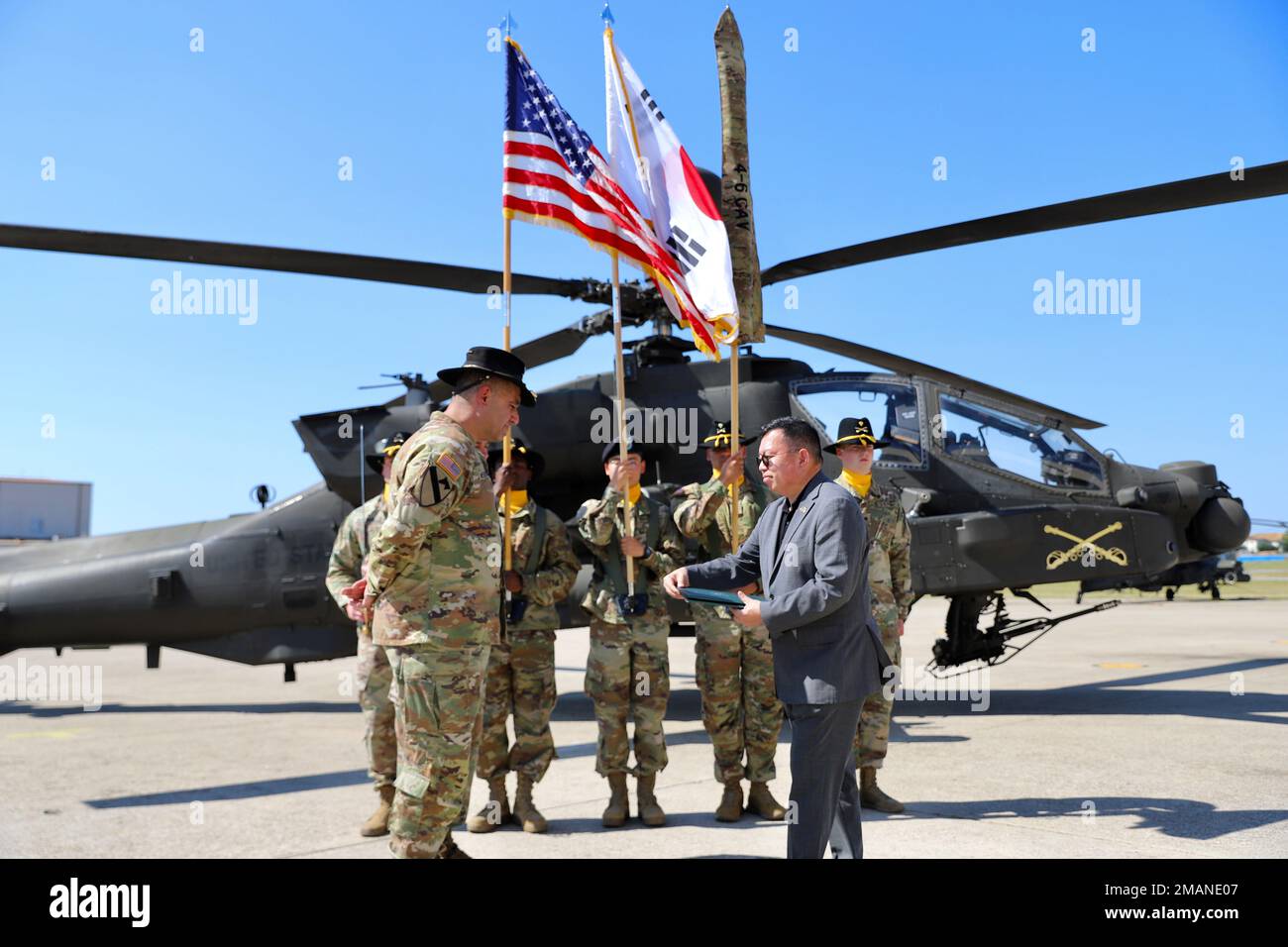 Lt. Col. Eric Megerdoomian receives an award from Lt. Gen. (Ret.) Chun ...
