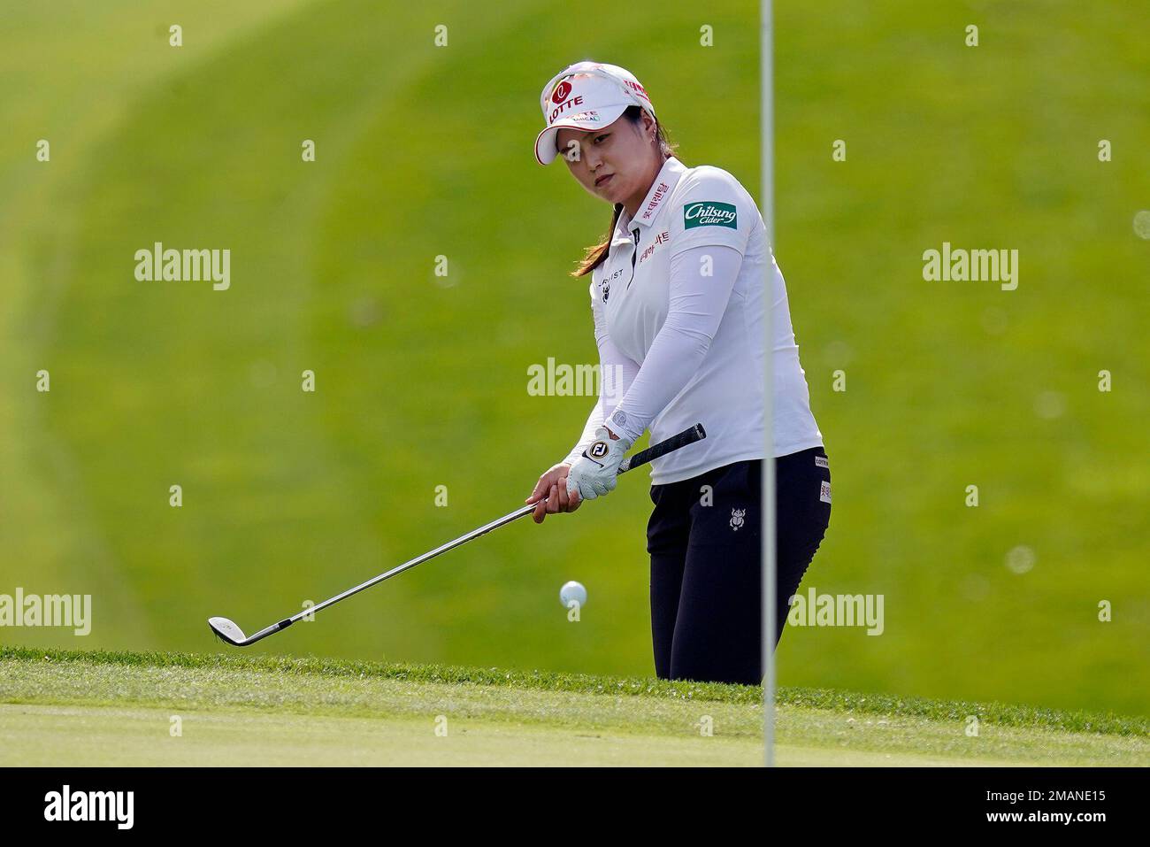 Hye-Jin Choi, of South Korea, chips onto the 18th green during the ...