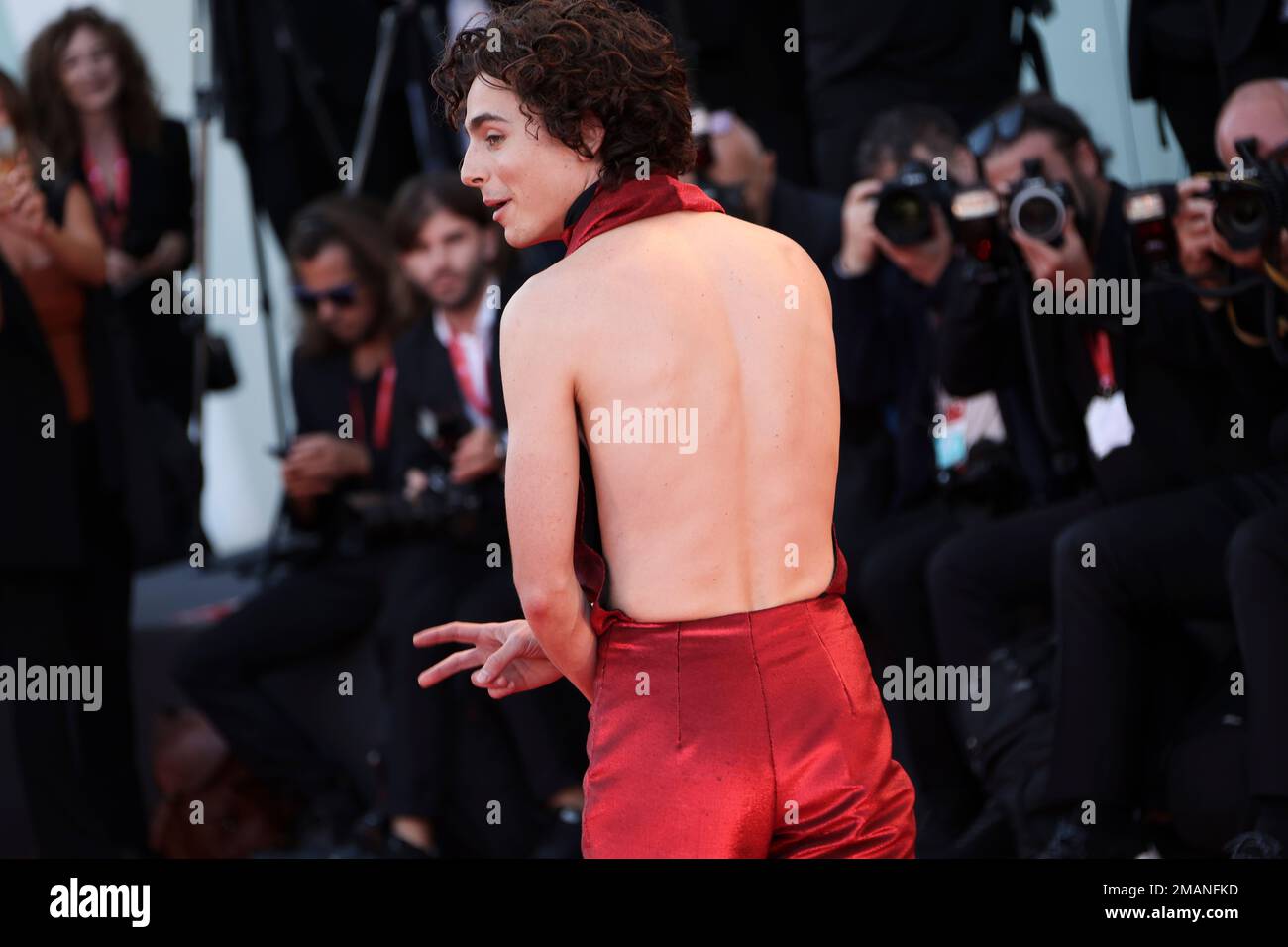 Timothee Chalamet poses for photographers upon arrival at the premiere of the film 'Bones and ...