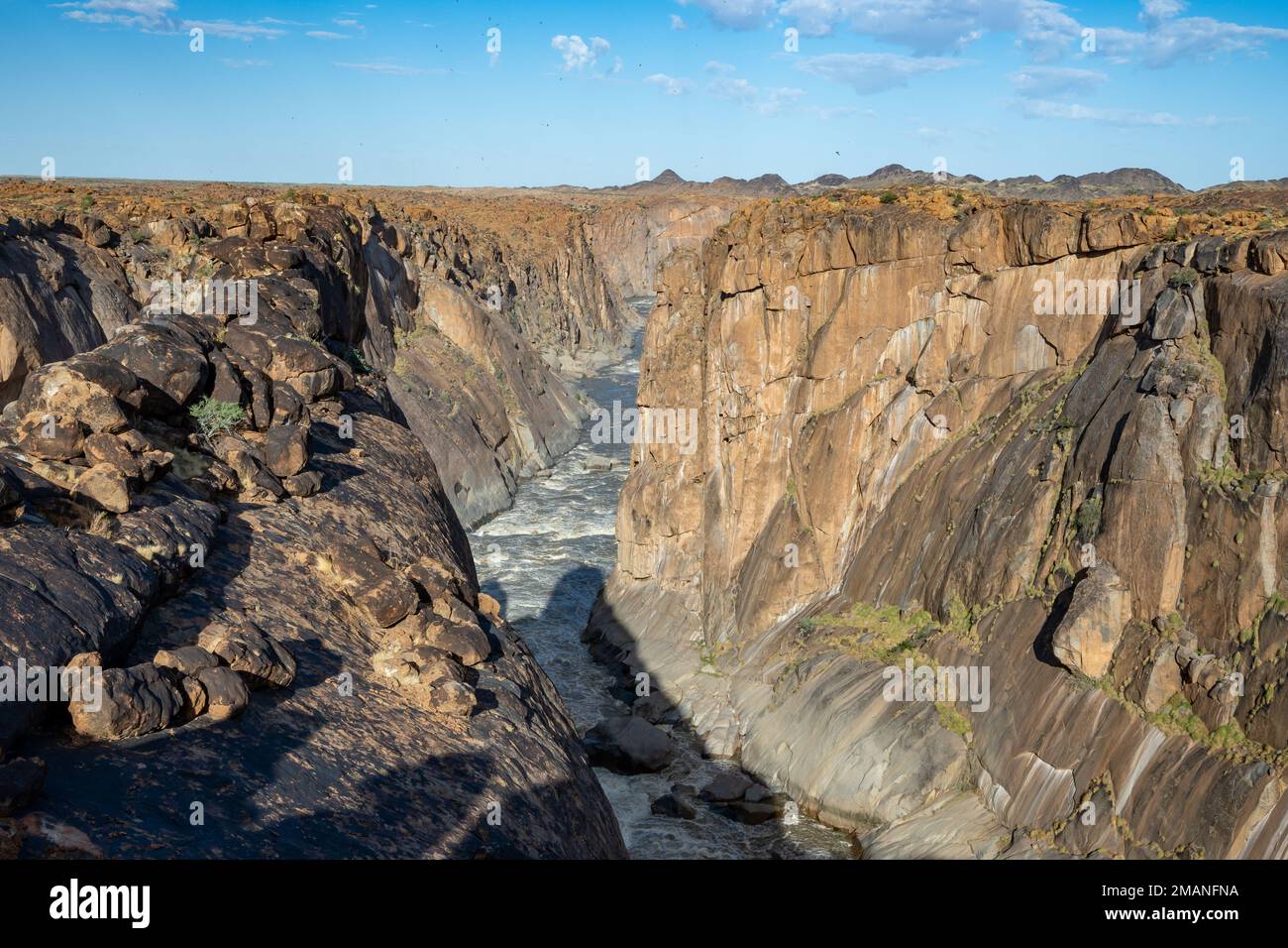 Deep gorge cut by the Orange River at Augrabies Falls National Park ...