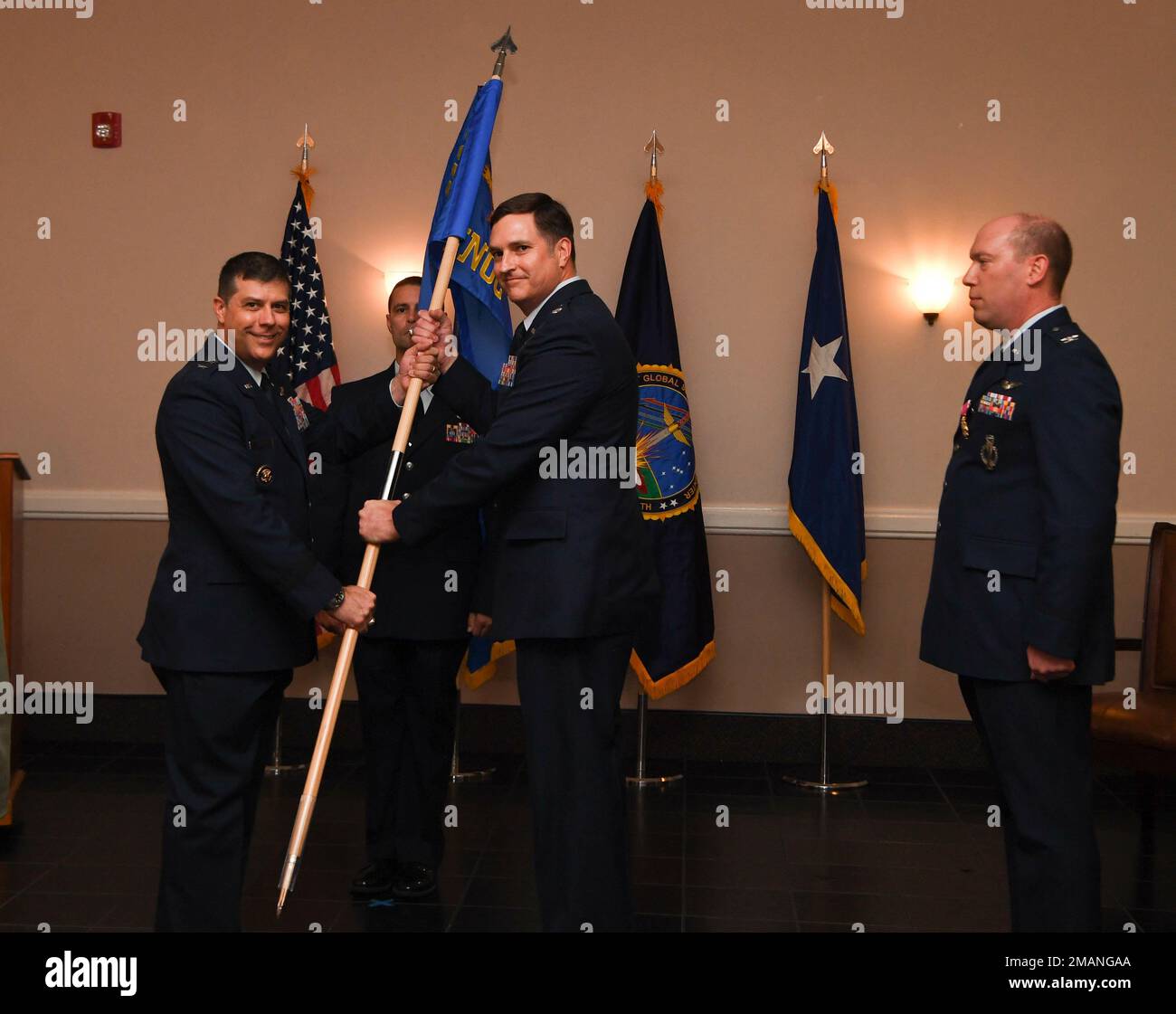 Lt. Col. John Baker, middle, incoming Joint Nuclear Operations Center ...