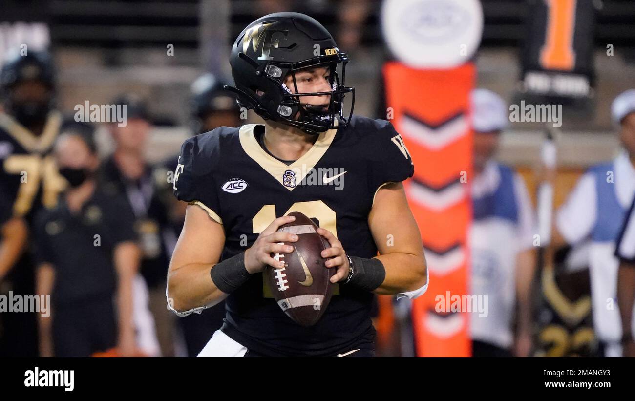 Wake Forest quarterback Mitch Griffis (12) looks to pass against VMI ...
