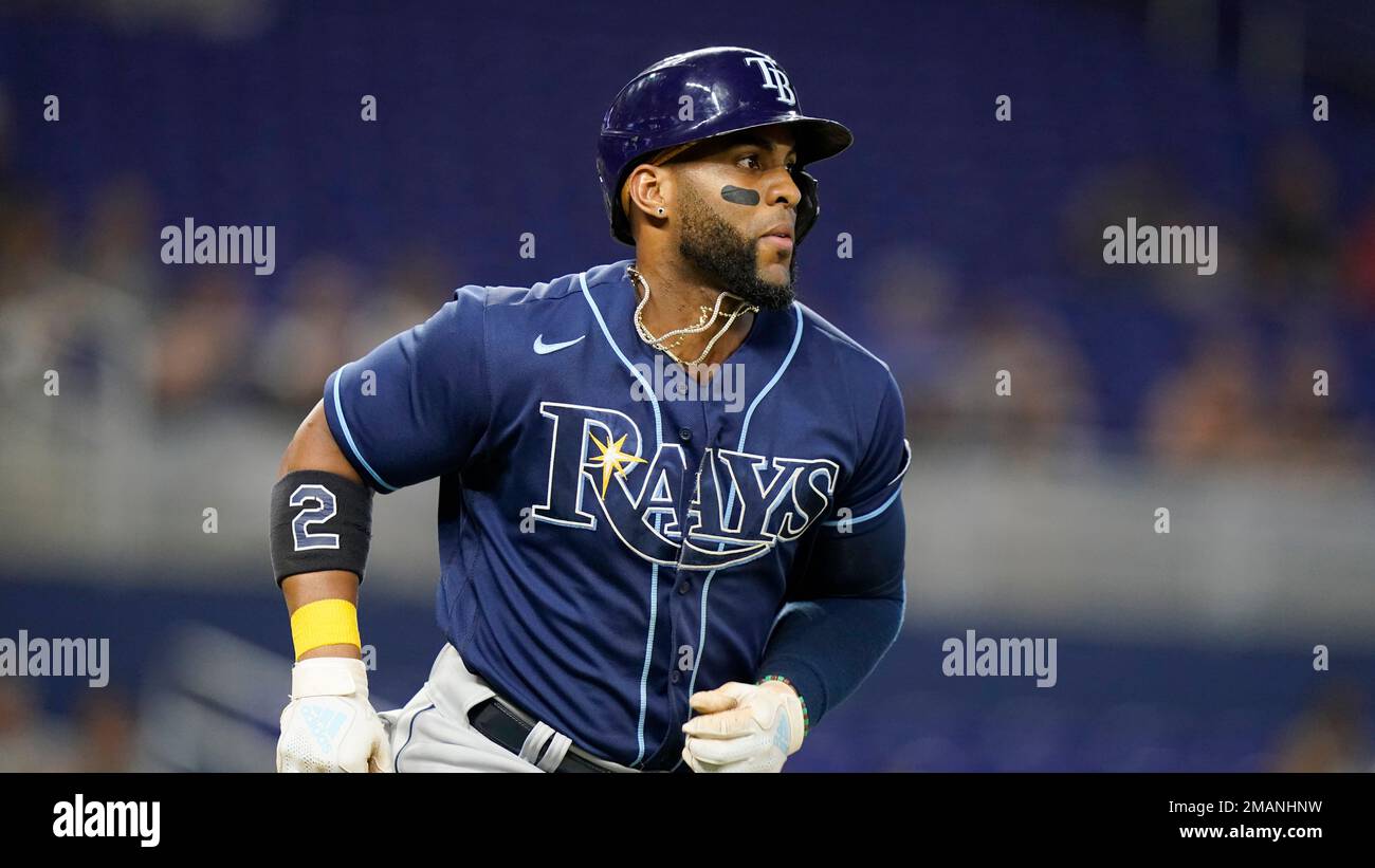 Tampa Bay Rays' Yandy Diaz runs after hitting a single during the first ...
