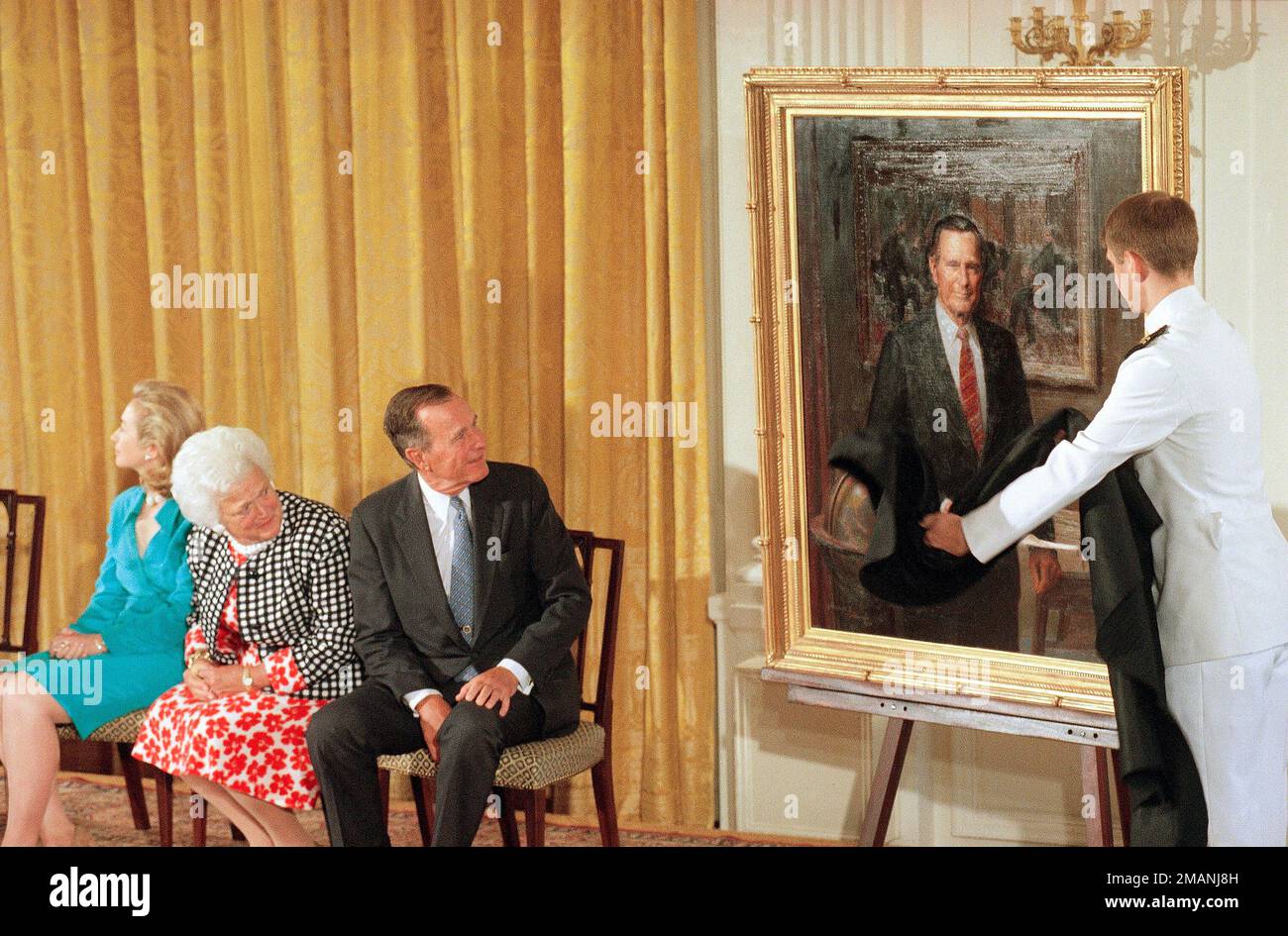 FILE - Former President George H.W. Bush and wife Barbara Bush look as ...
