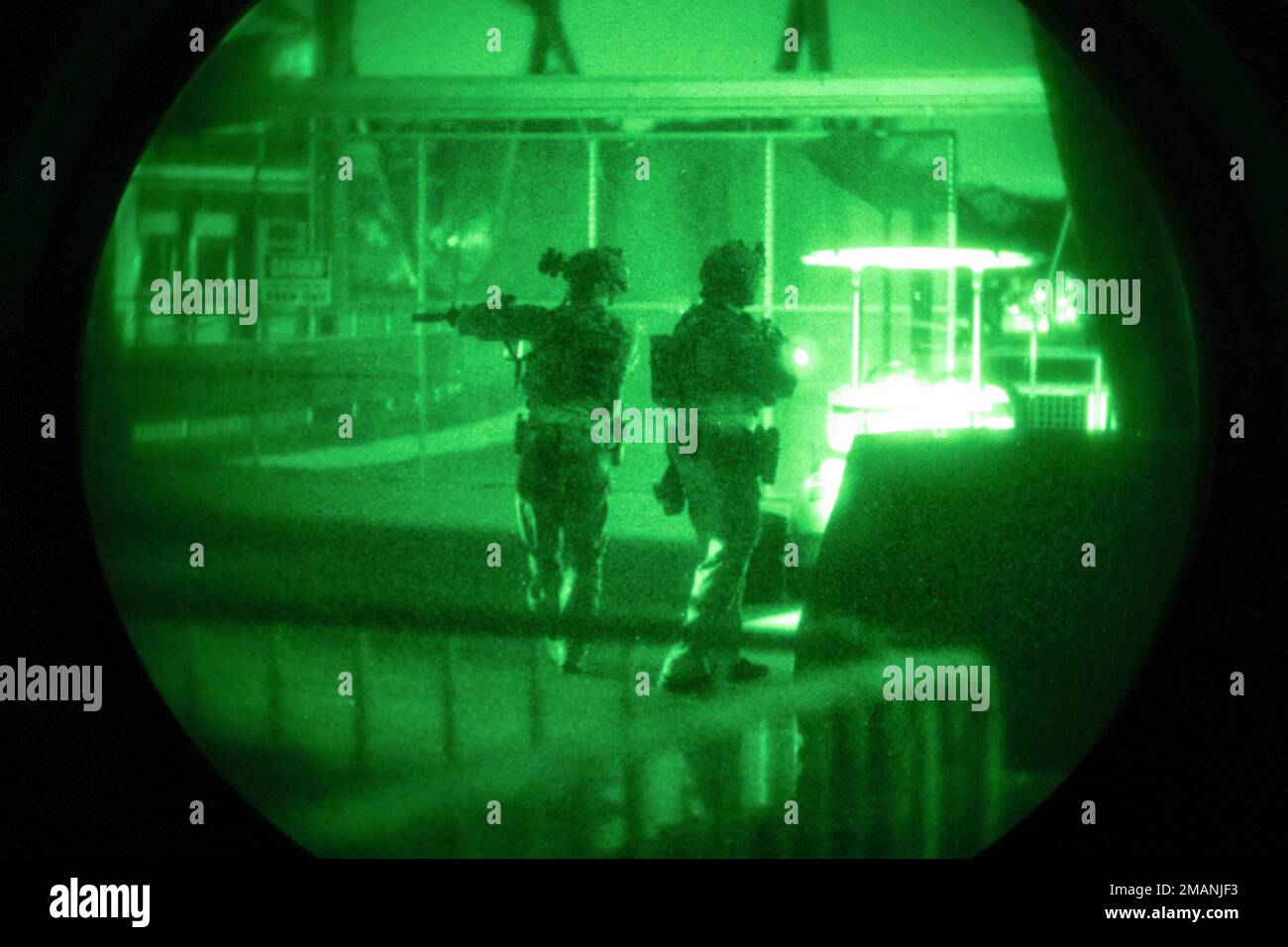 Members of the Federal Bureau of Investigation clear an area during a ...