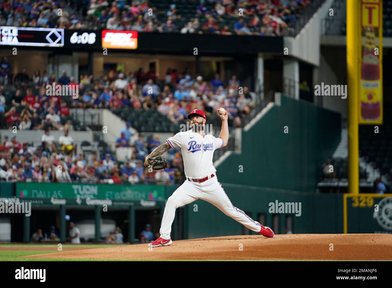 Texas Rangers starting pitcher Dallas Keuchel winds up to throw to the ...