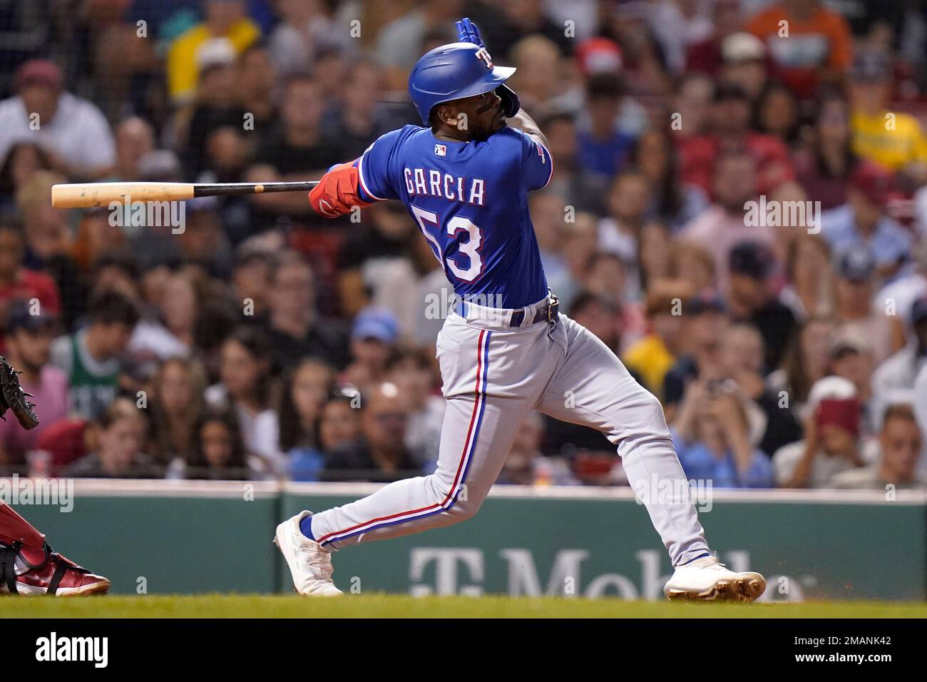 Texas Rangers' Adolis Garcia grounds into a fielder's choice, allowing ...