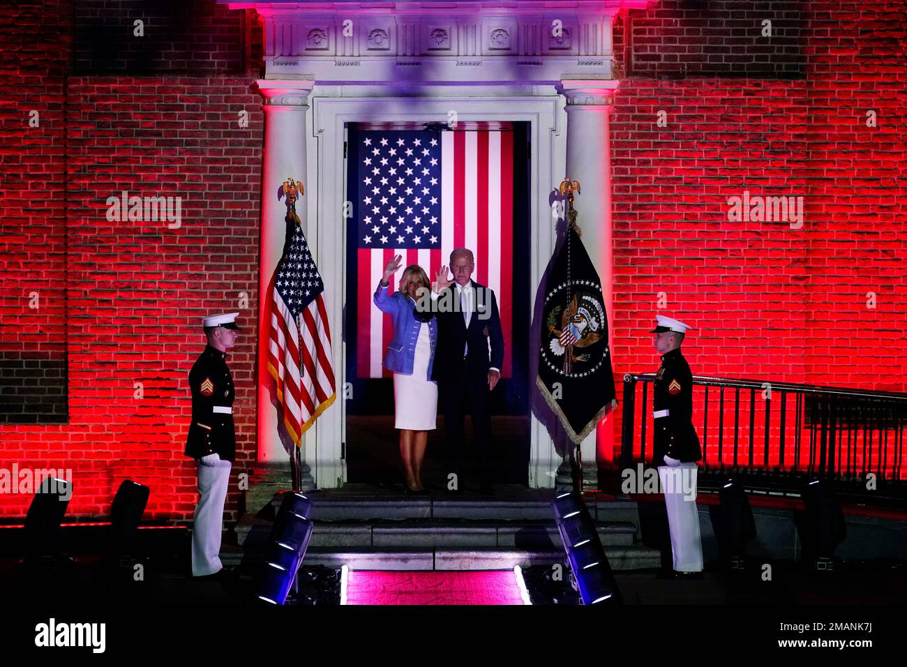 President Joe Biden and first lady Jill Biden wave after a speech ...