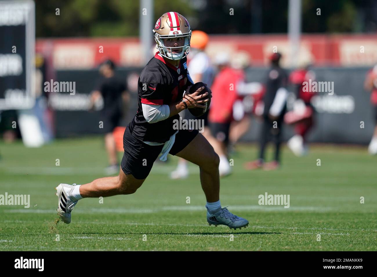 San Francisco 49ers quarterback Brock Purdy takes part in drills at the ...