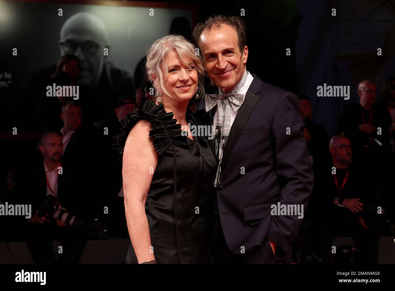 Maya Goded, left, and Daniel Gimenez Cacho pose for photographers upon ...