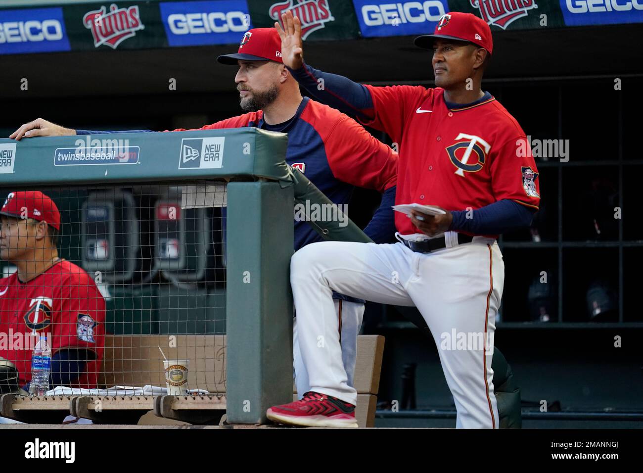 Minnesota Twins manager Rocco Baldelli, left, and assistant bench coach ...
