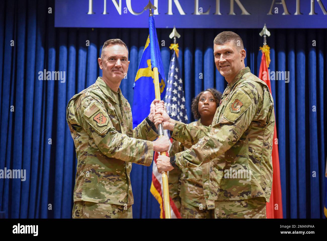 Col. Bradley Weast (left), 39th Medical Group commander, takes the ...
