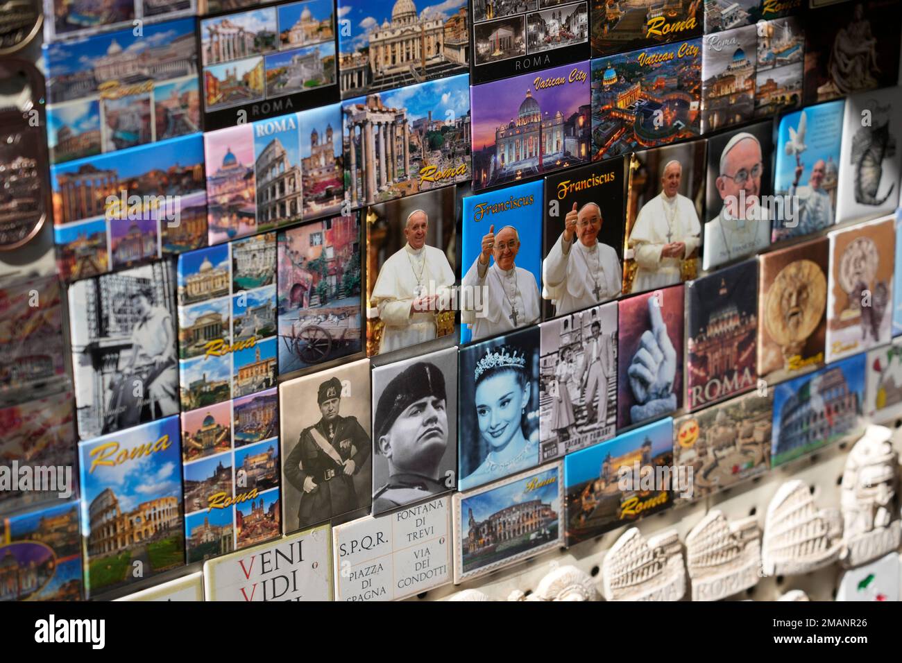 Magnets of Rome's famous sightseeing are displayed at a tourist kiosk ...