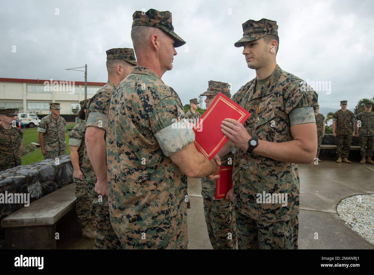 U.S. Marine Corps Col. Matthew Tracy, left, commanding officer of 4th ...