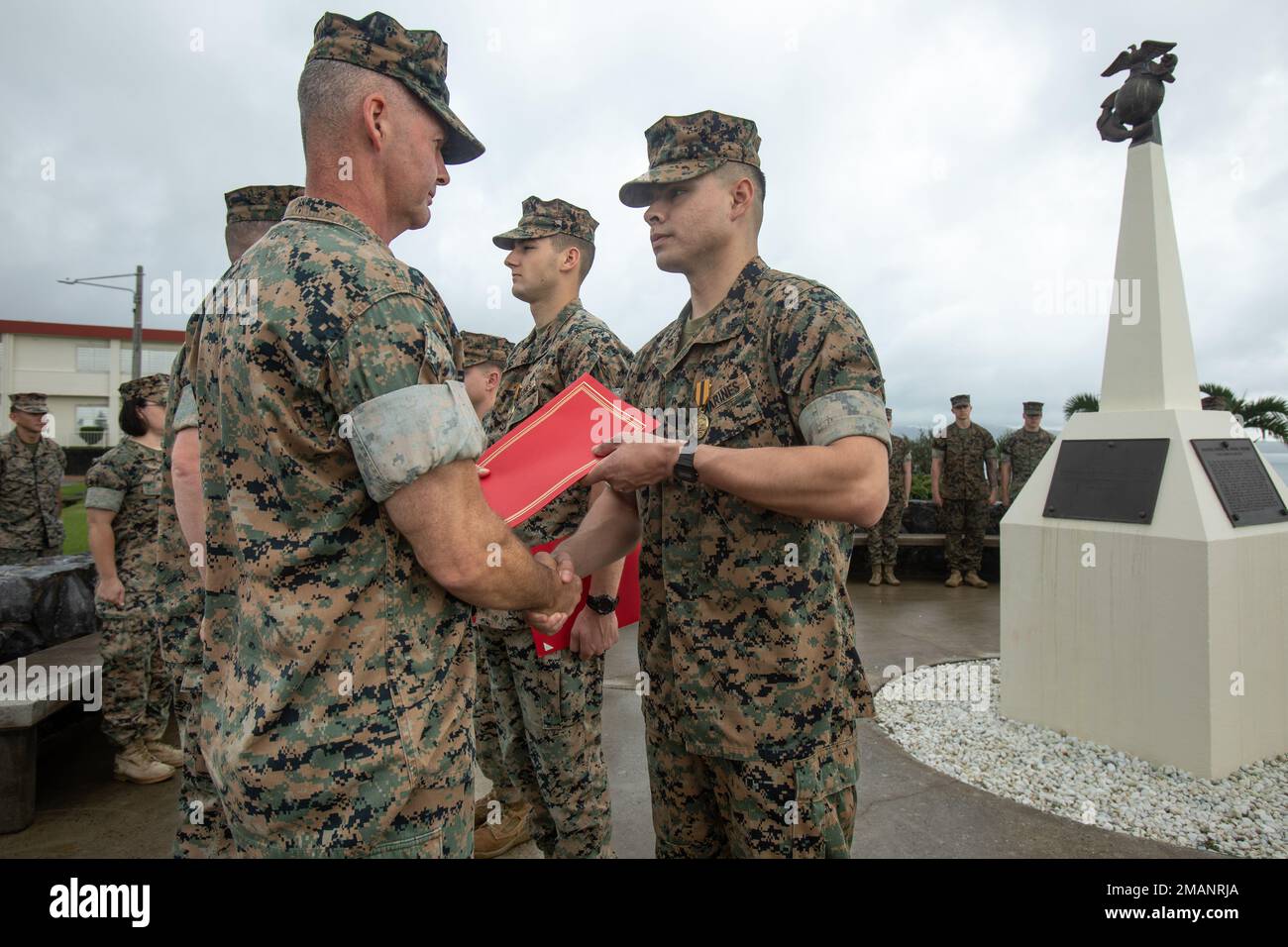 U.S. Marine Corps Col. Matthew Tracy, left, commanding officer of 4th ...