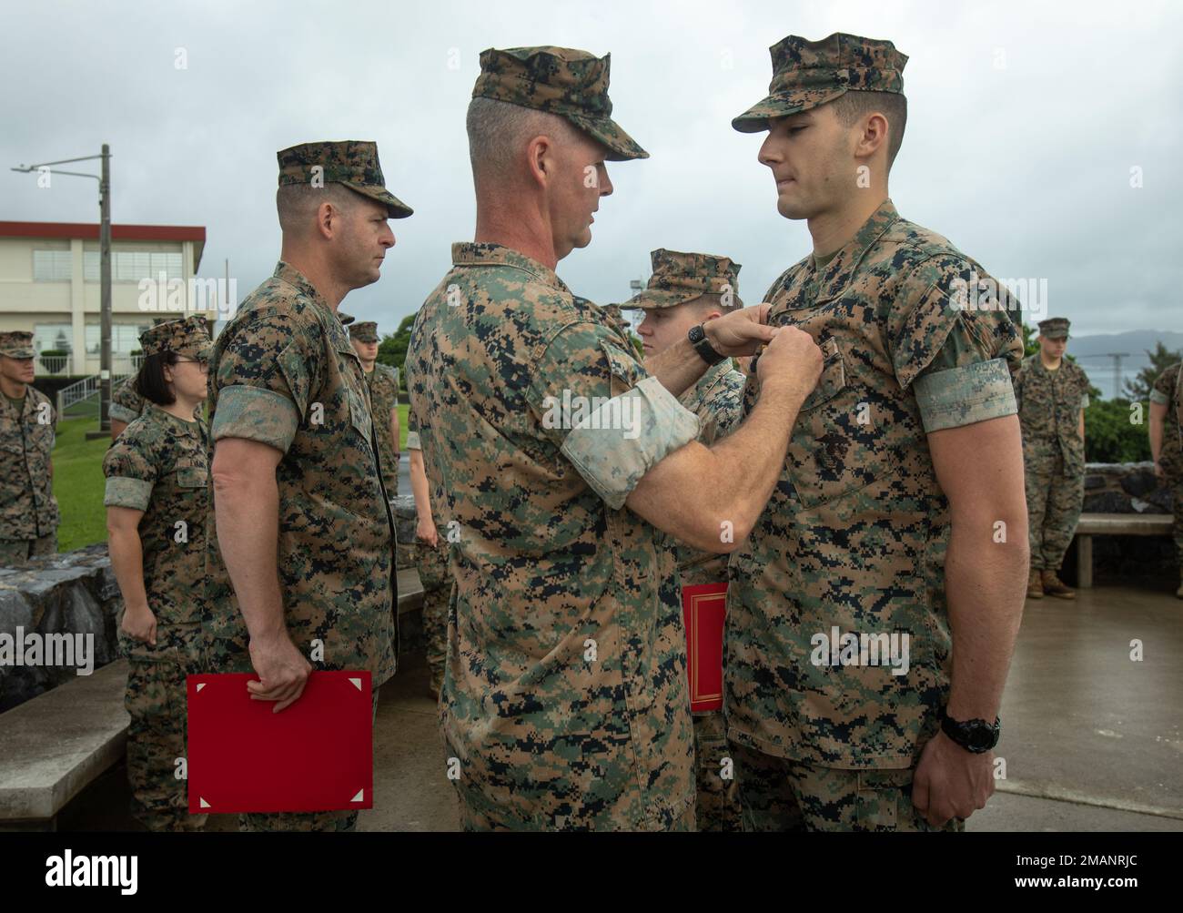 U.S. Marine Corps Col. Matthew Tracy, center, commanding officer of 4th ...