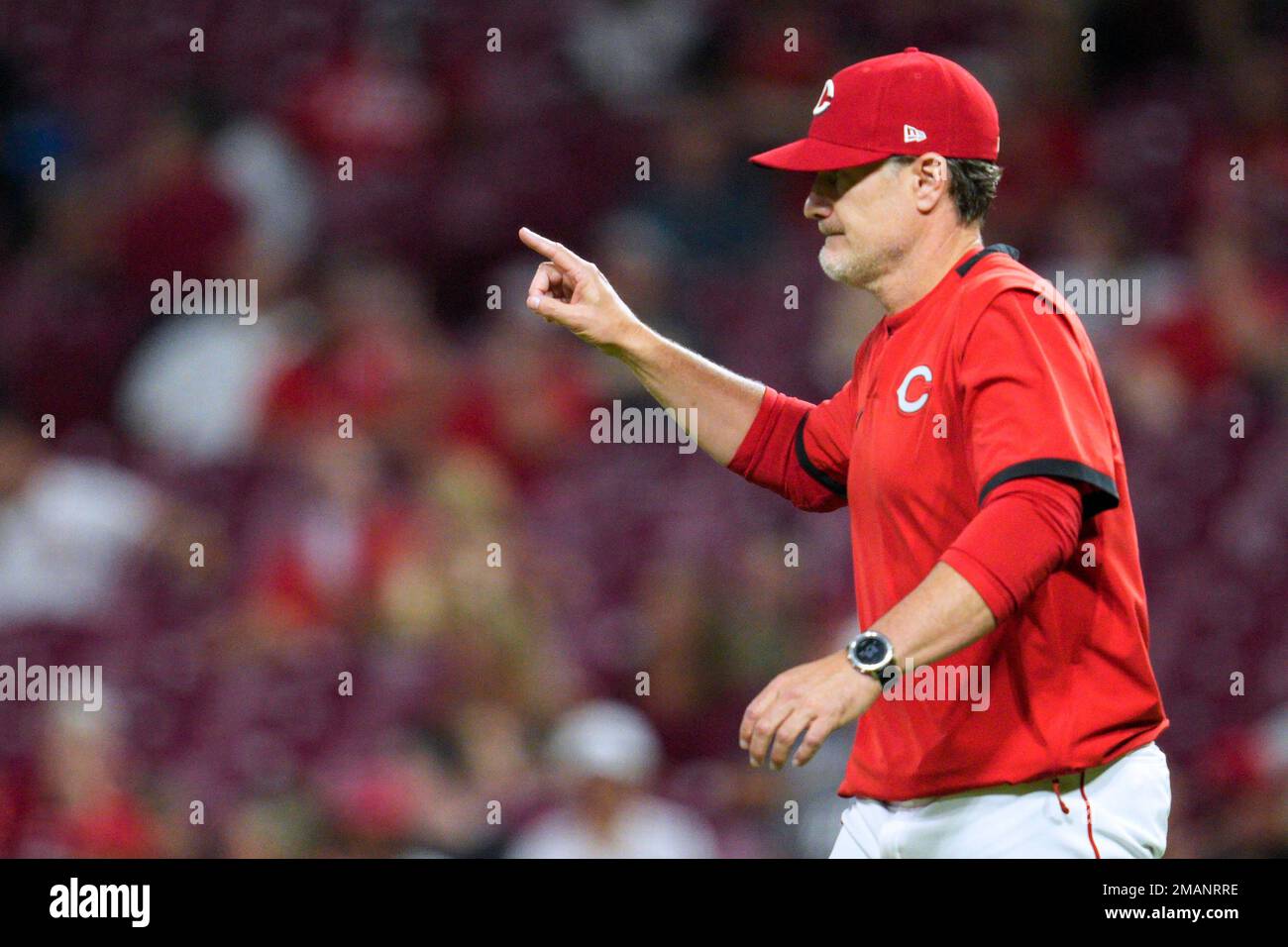 Cincinnati Reds manager David Bell signals to the bullpen during the ...