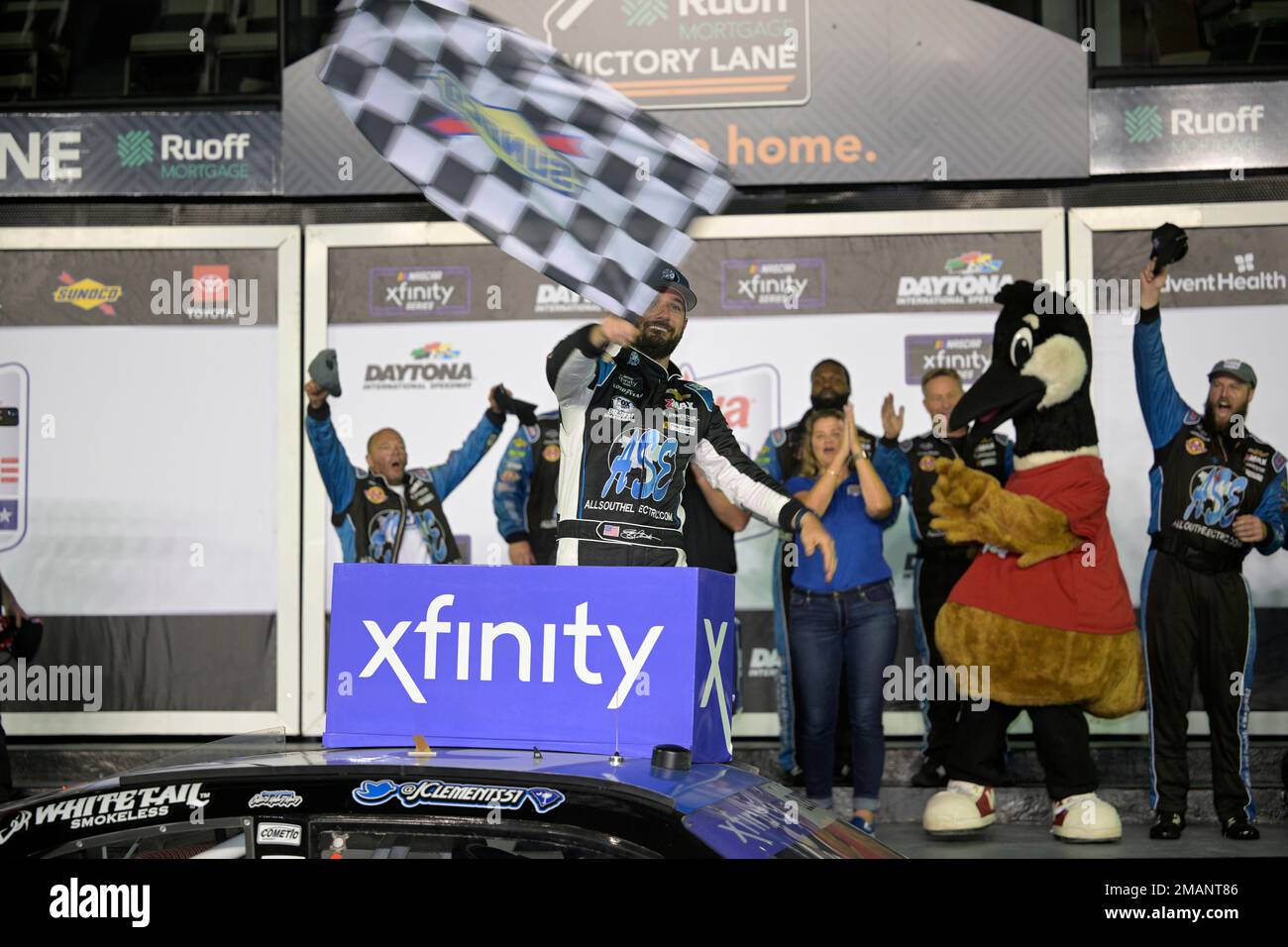 Jeremy Clements celebrates in Victory Lane after winning a NASCAR ...