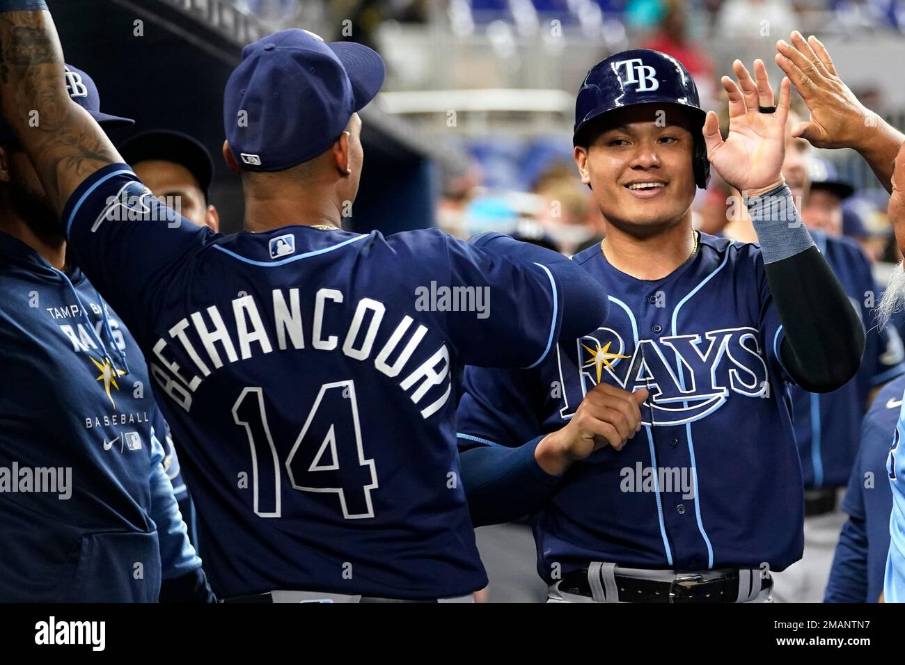 Tampa Bay Rays' Yu Chang, right, is congratulated after scoring on a ...