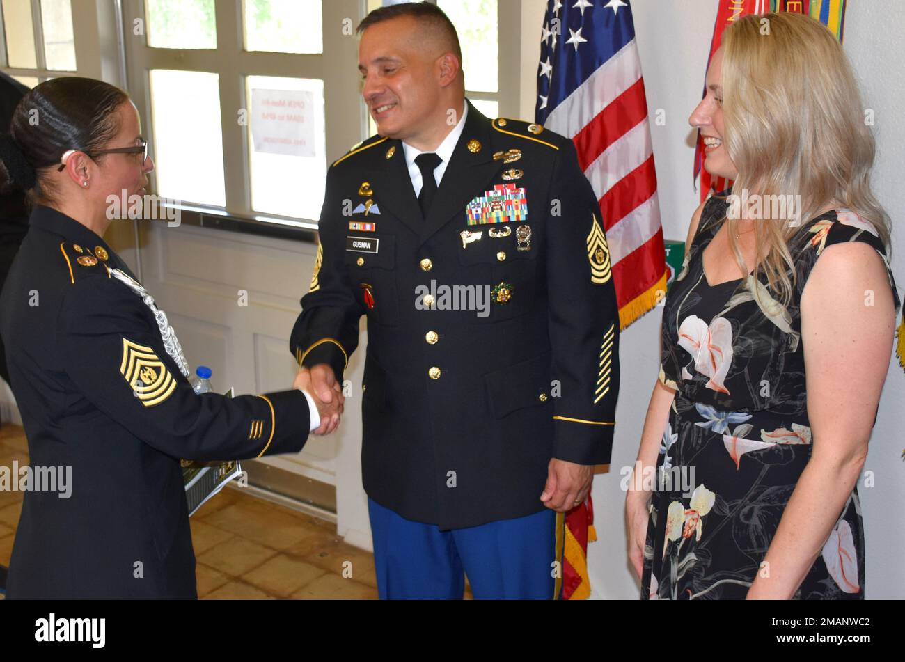 Command Sgt. Maj. Julie Saorrono, left, congratulates Command Sgt. Maj ...