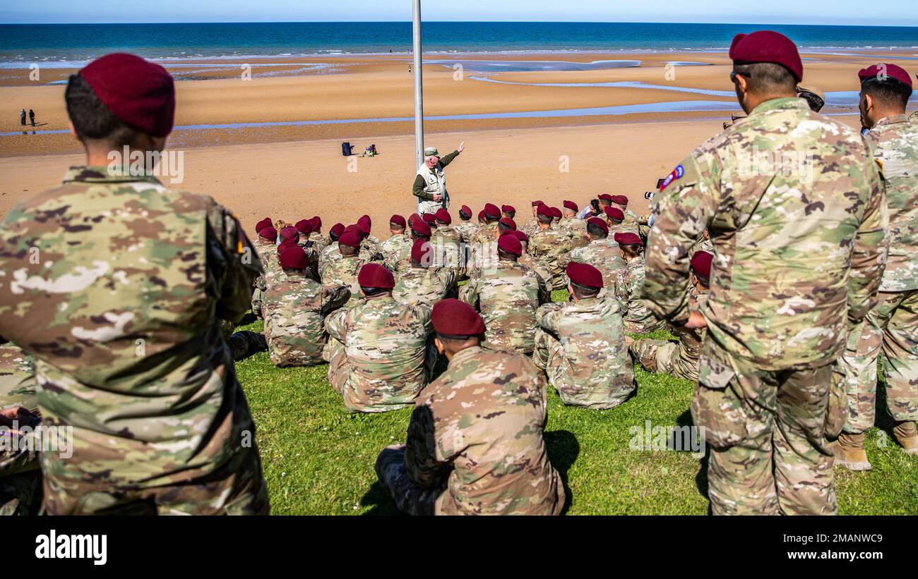 Service members listen to Keith Nightingale as he talks about D-Day ...