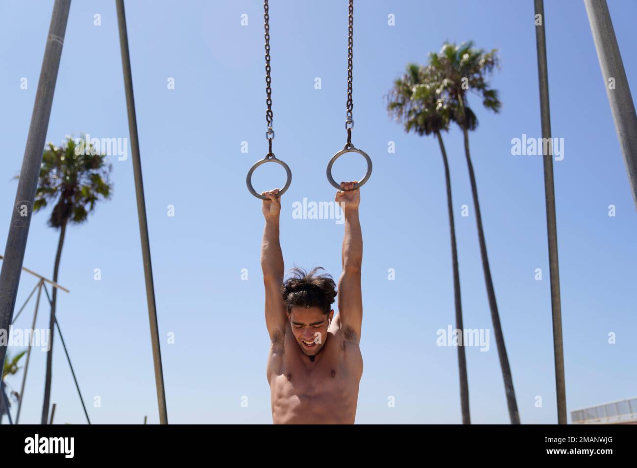 Louis Spaci, visiting from France, works out, amid triple digit ... Louis Spaci, visiting from France, works out, amid triple digit ...