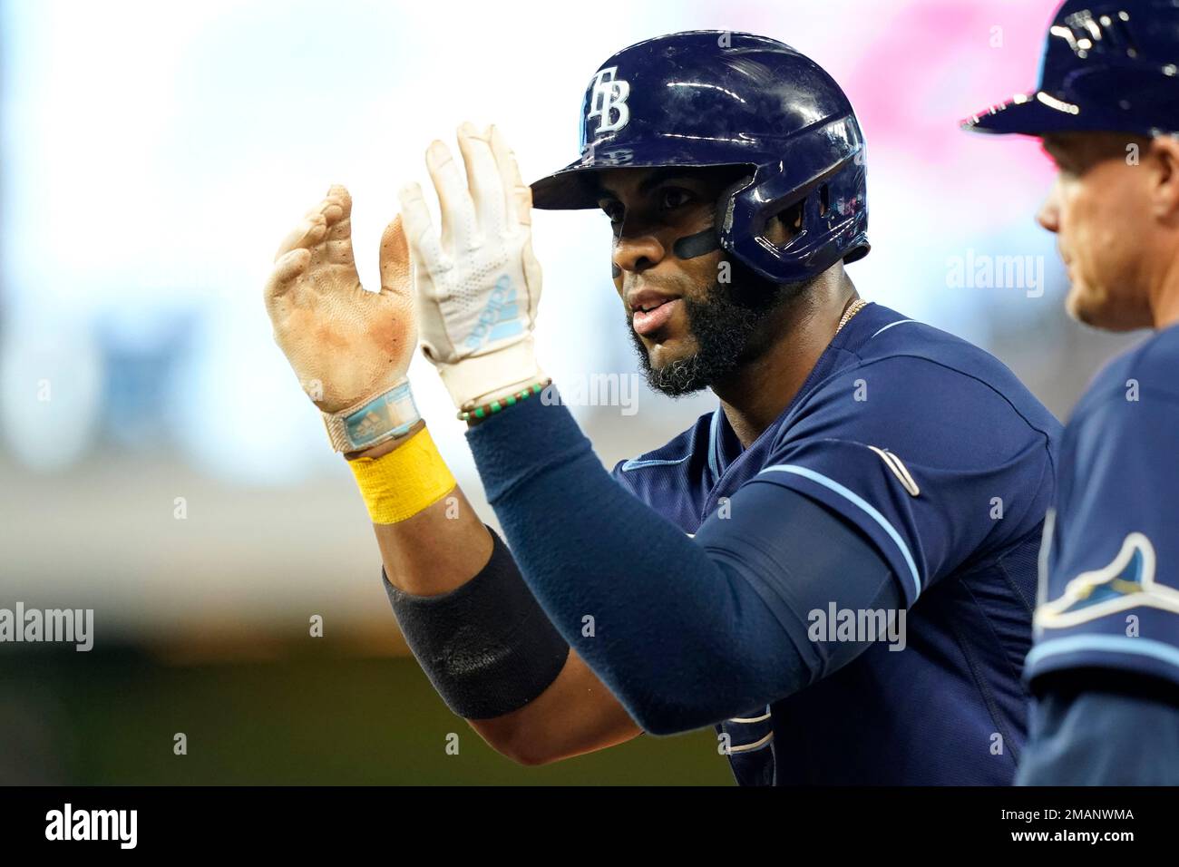 Tampa Bay Rays' Yandy Diaz reacts after hitting a single during the ...
