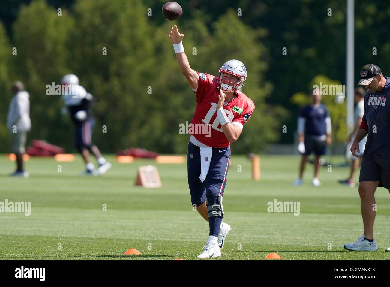 New England Patriots quarterback Mac Jones passes during an NFL ...