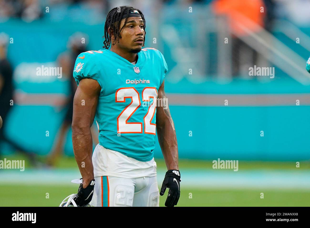Miami Dolphins safety Elijah Campbell watches during team warmups ...