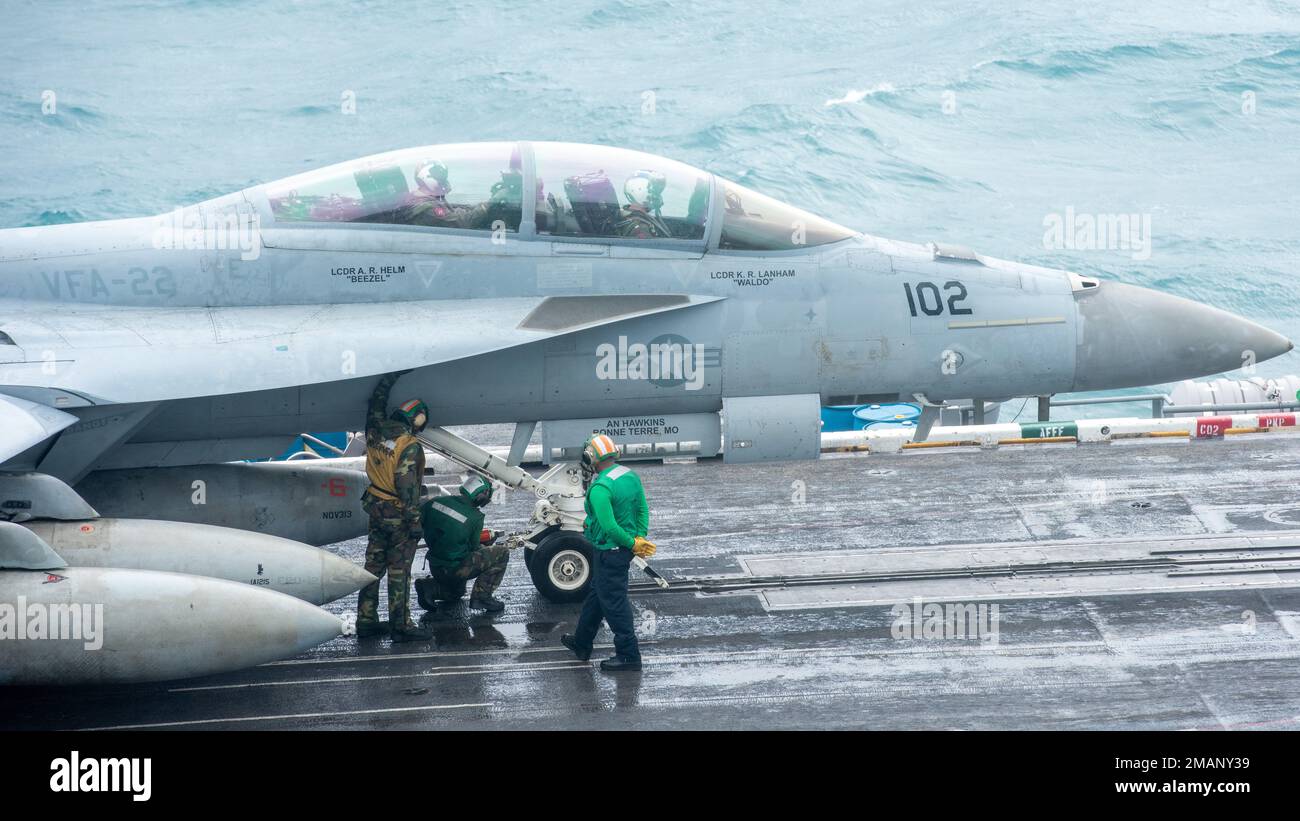 230119-N-NX635-1101 SOUTH CHINA SEA (Jan. 19, 2023) U.S. Navy Sailors prepare to launch an F/A ...