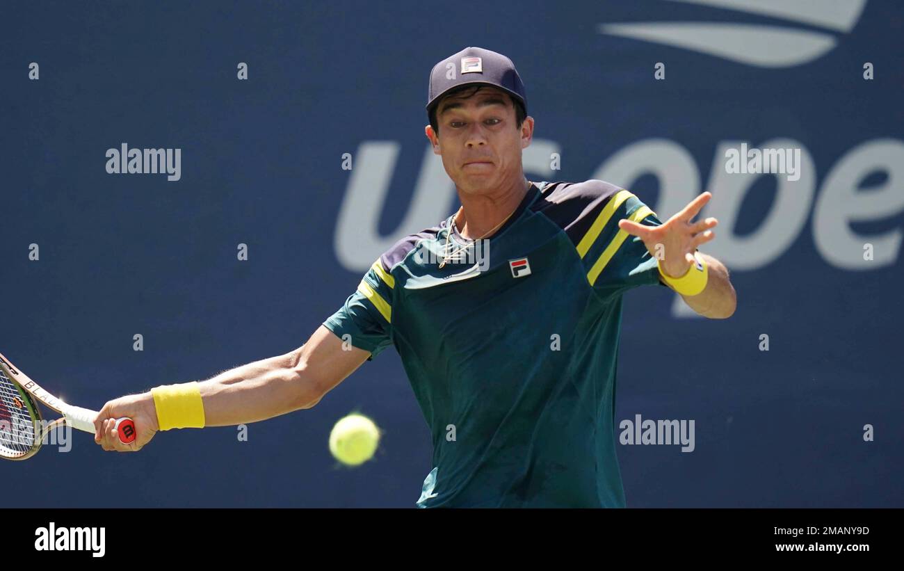 Mackenzie McDonald of the USA returns the serve during the first round ...