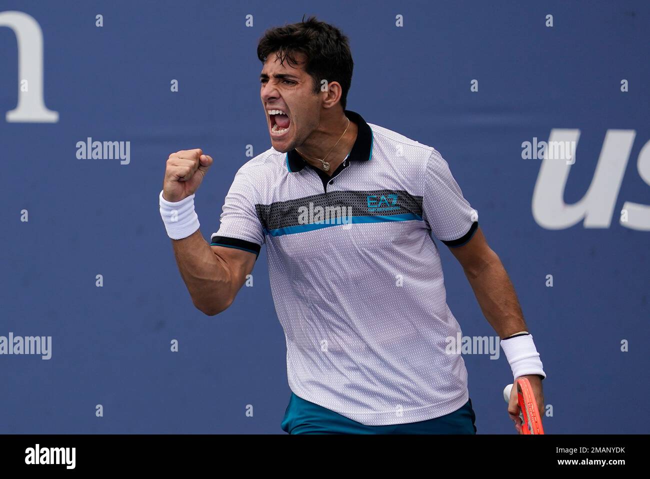 Cristian Garin, of Chile, reacts after a point against Alex de Minaur ...