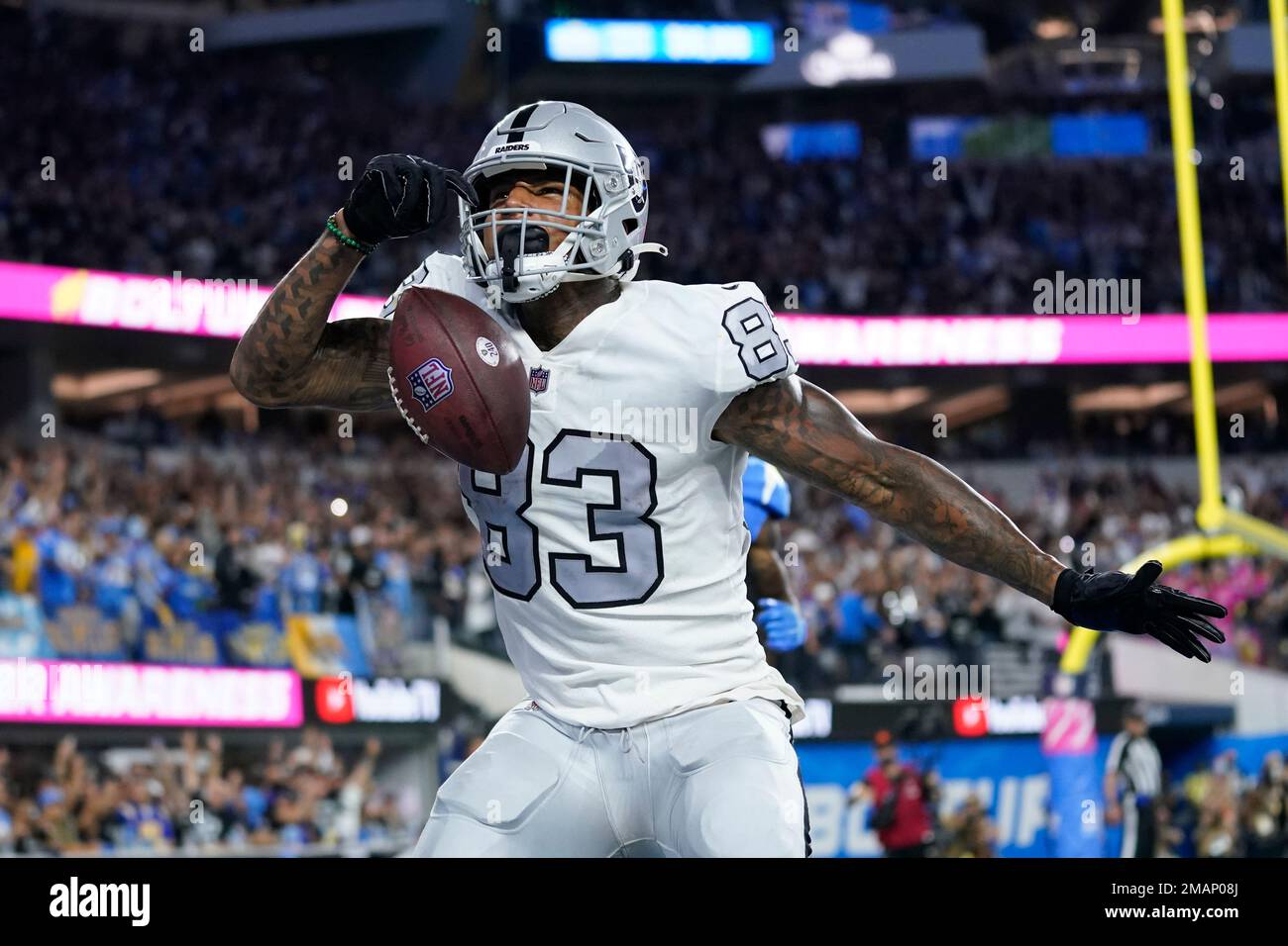 FILE - Las Vegas Raiders' Darren Waller reacts after scoring a ...