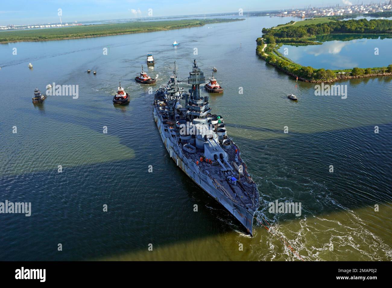 The USS Texas is towed down the Houston Ship Channel Wednesday, Aug. 31 ...