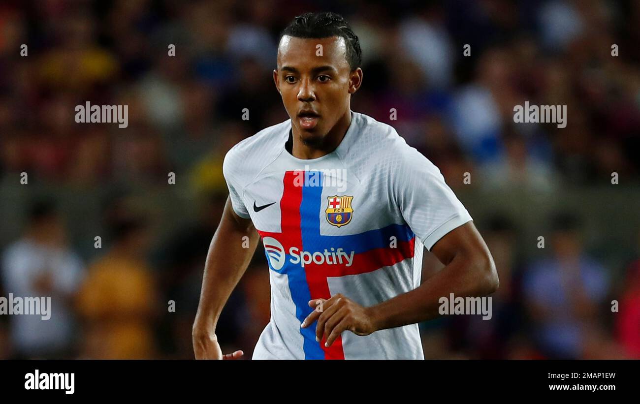 Barcelona's Jules Kounde runs with the ball during a charity friendly ...