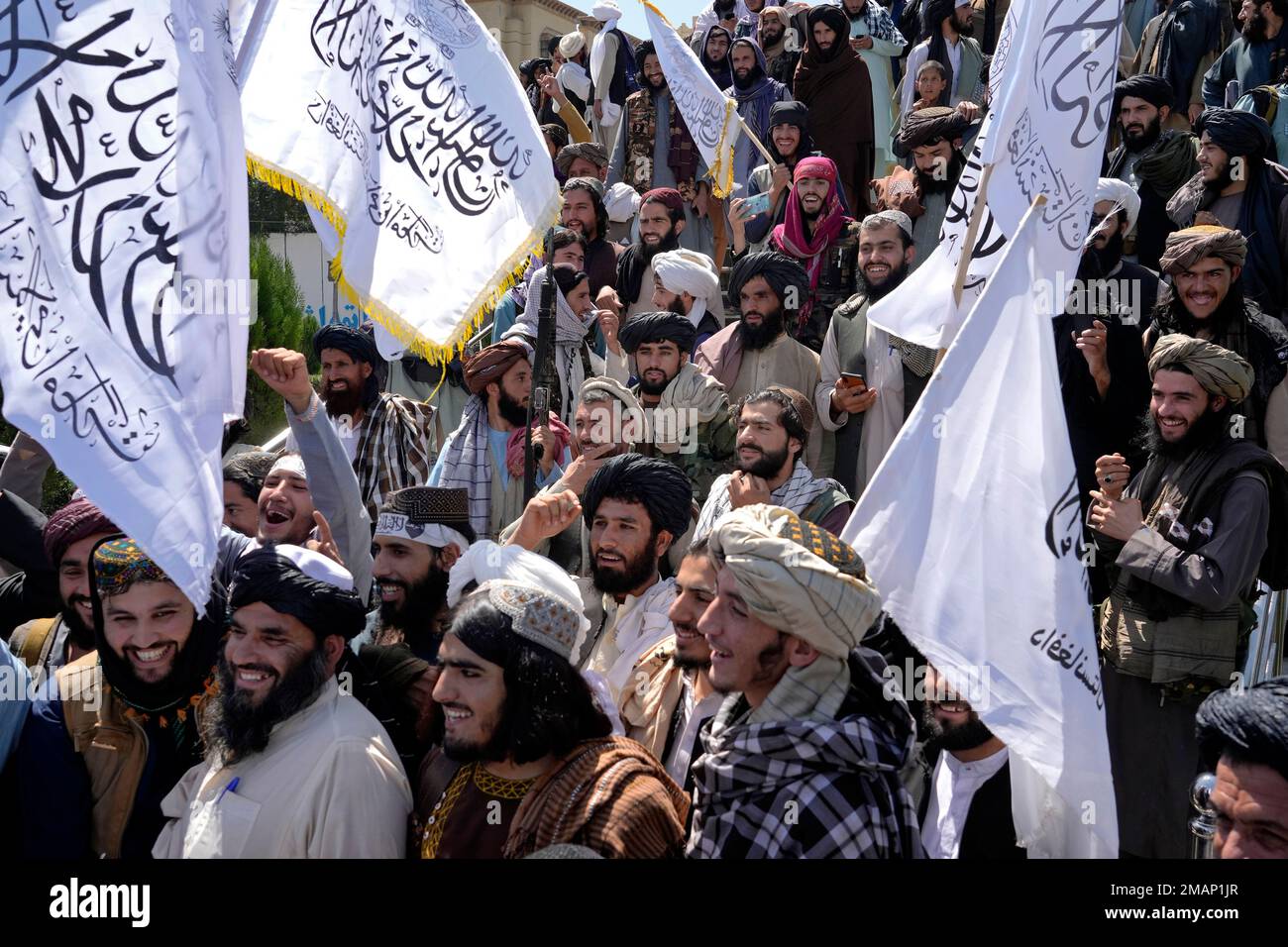 Taliban fighters celebrate the first anniversary of the withdrawal of ...