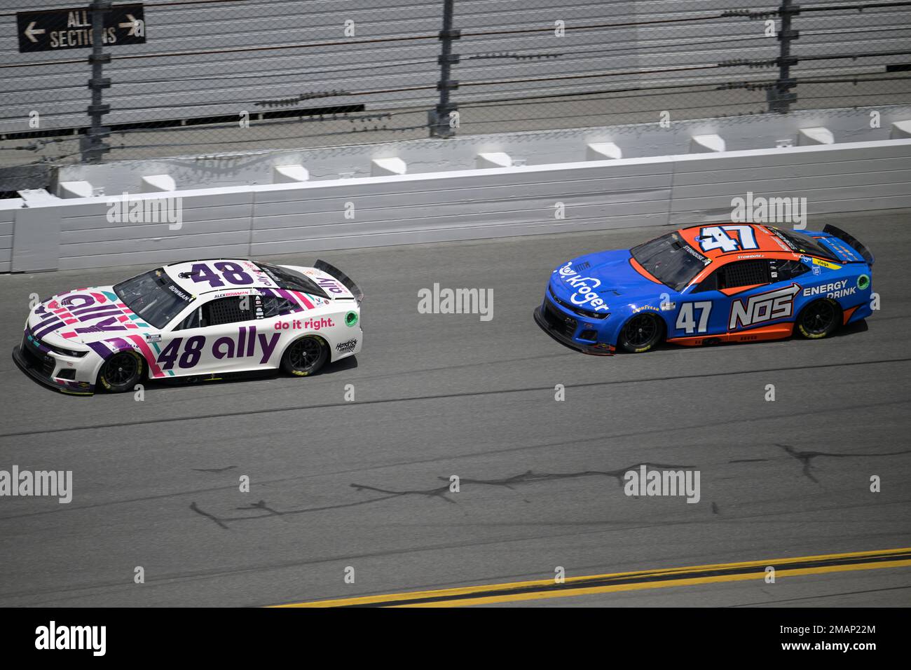 Ricky Stenhouse Jr. (47) and Alex Bowman (48) drive along the front ...