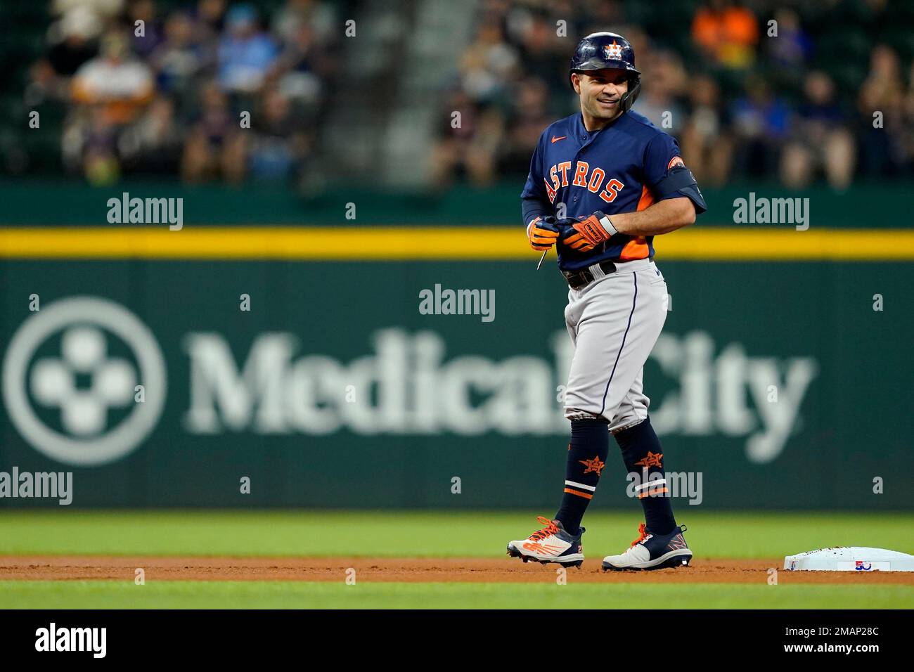 Houston Astros' Jose Altuve takes a lead off of second during a ...