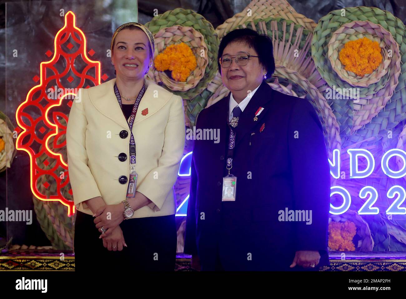 Indonesian Forestry Minister Siti Nurbaya Bakar, right, greets Egyptian ...