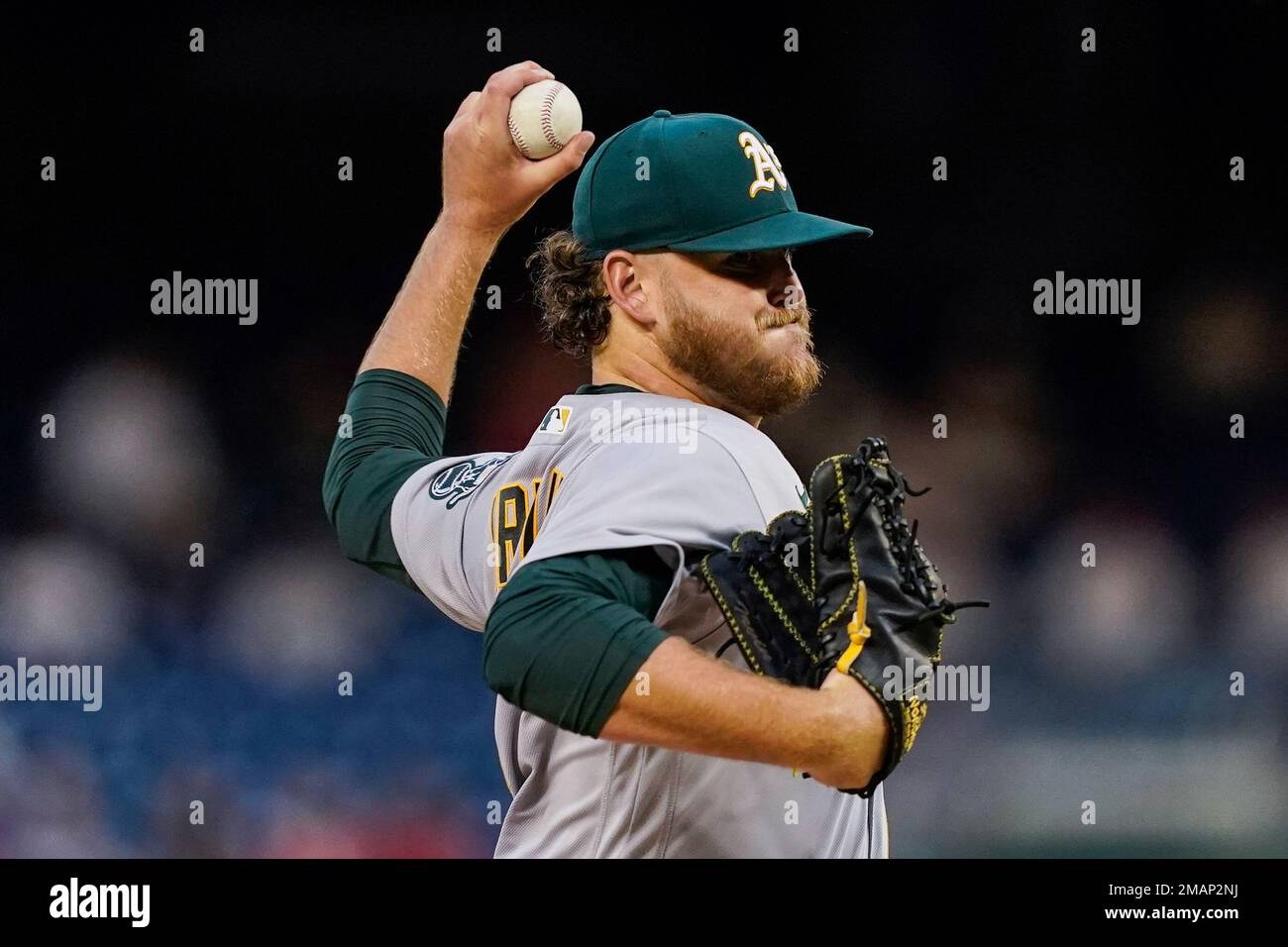 Oakland Athletics starting pitcher Cole Irvin throws during the first ...