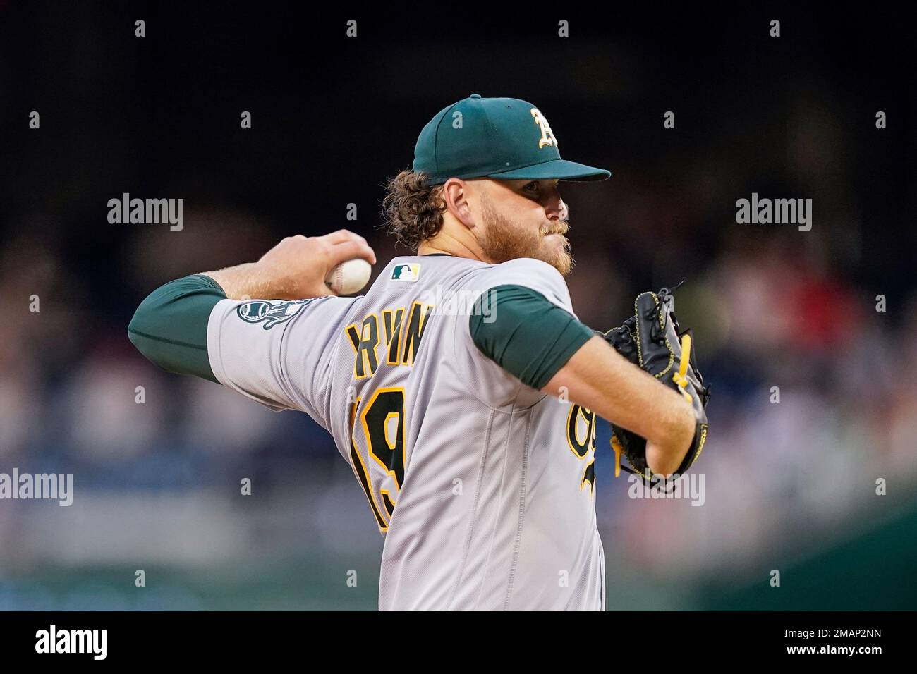 Oakland Athletics starting pitcher Cole Irvin throws during the first ...