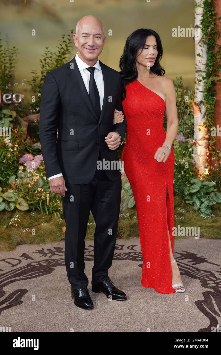 Jeff Bezos, left, and Lauren Sanchez pose for photographers upon their ...