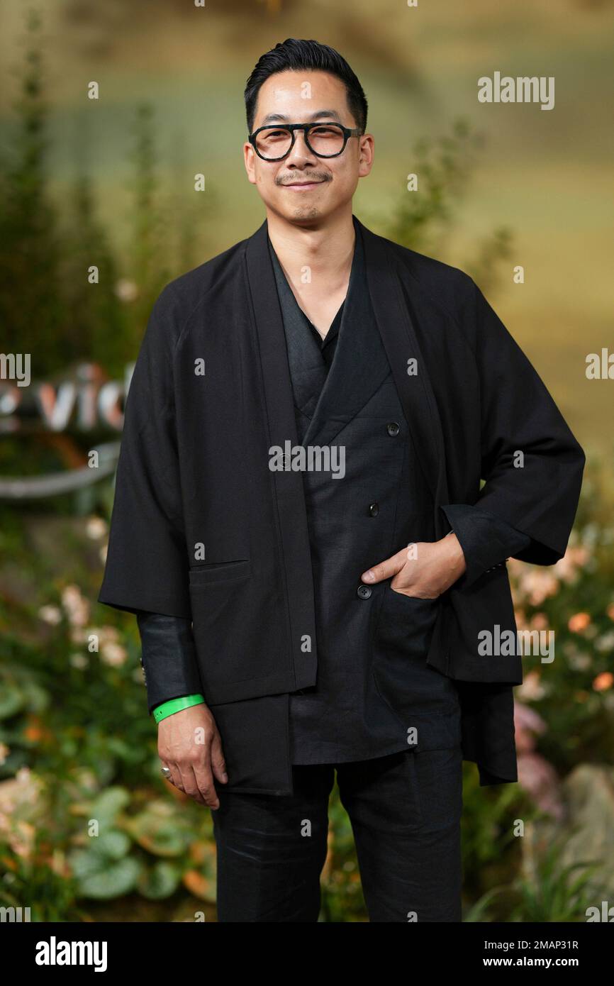 Wayne Che Yip poses for photographers upon arrival for the world ...