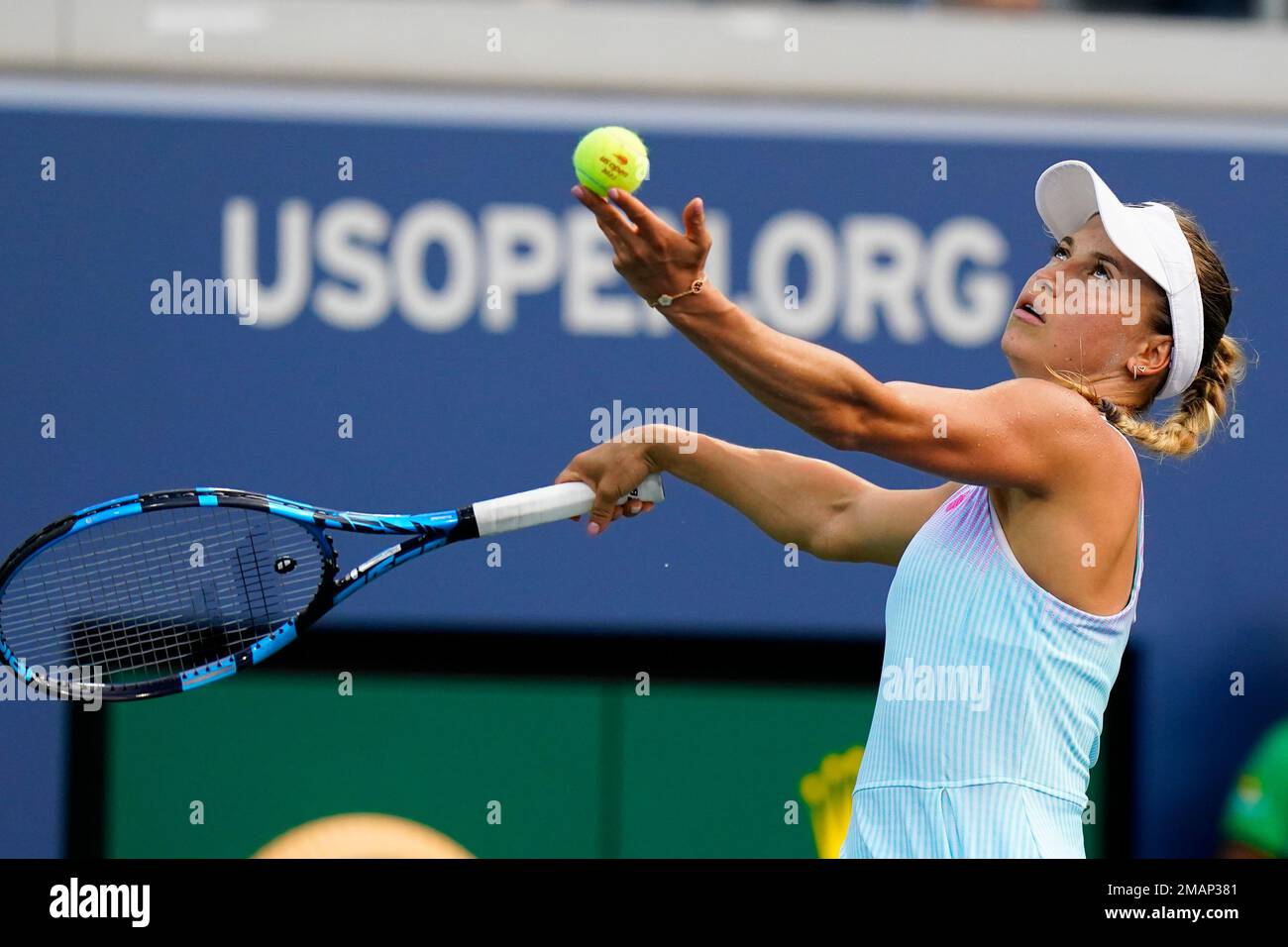Yulia Putintseva, of Kazakhstan, serves to Amanda Anisimova, of the ...