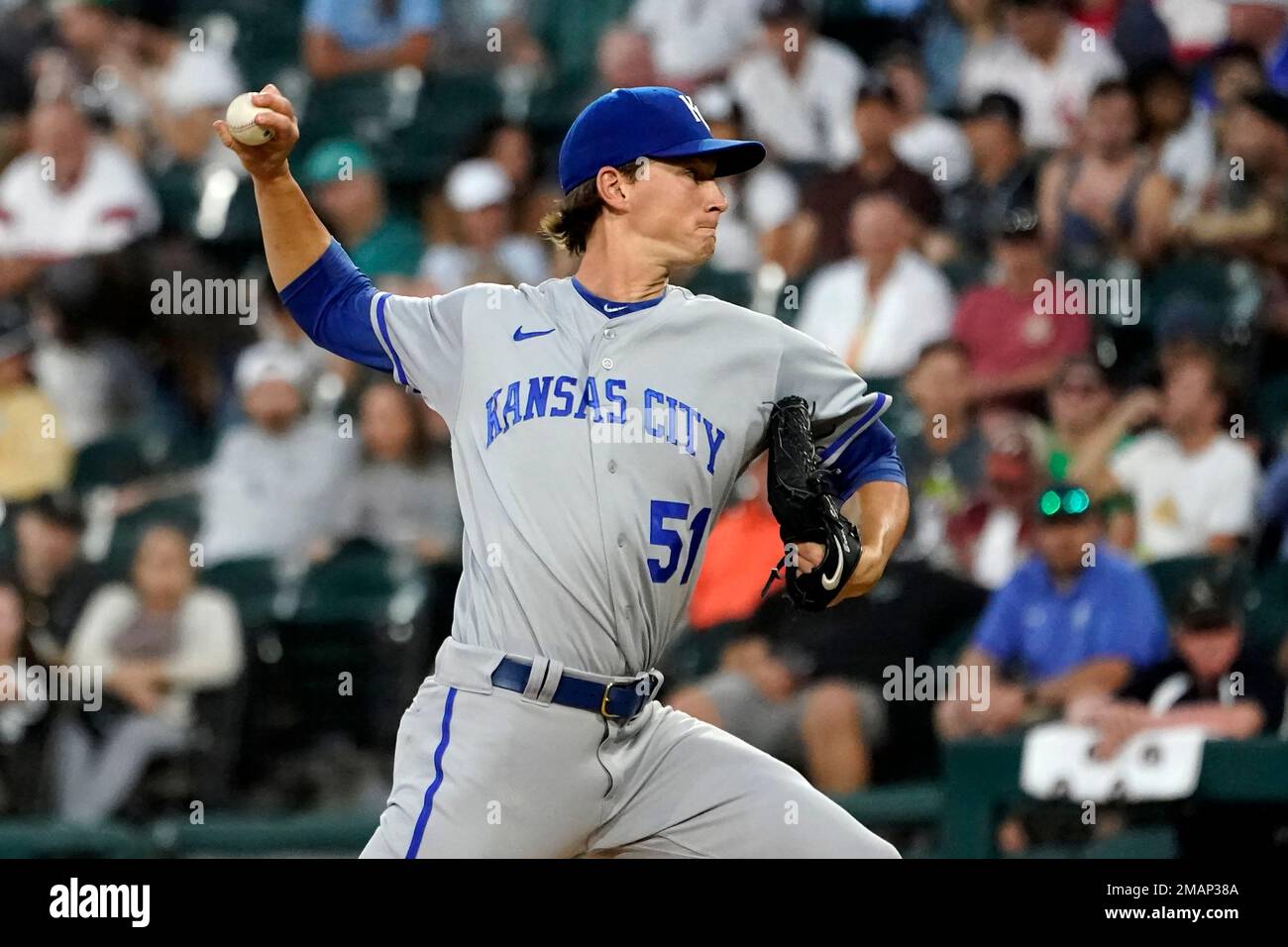Kansas City Royals starting pitcher Brady Singer delivers during the ...