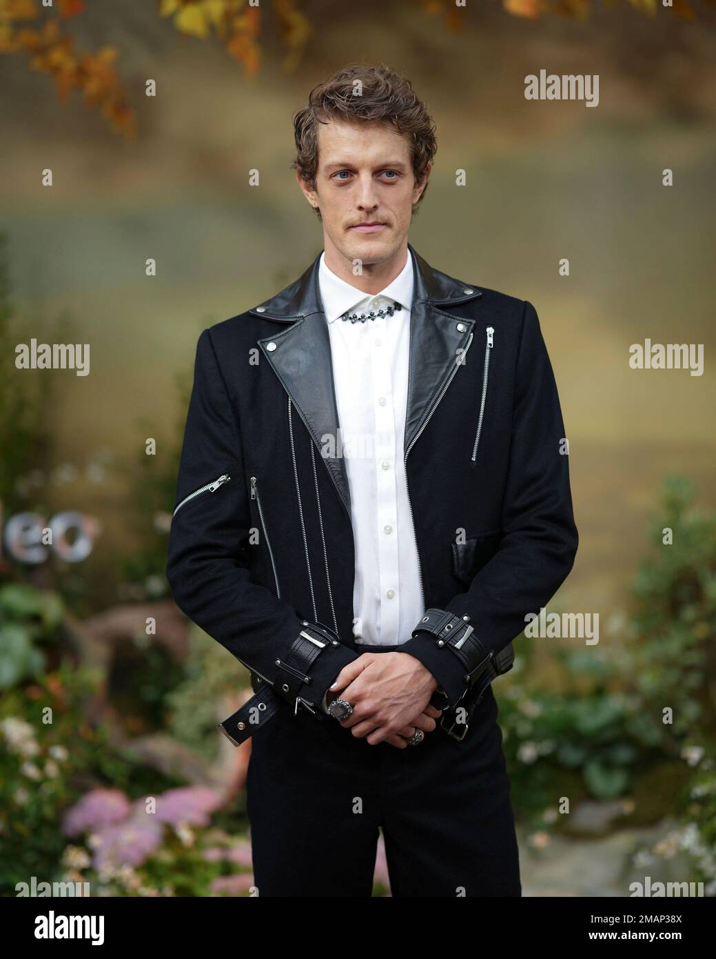 Robert Strange poses for photographers upon arrival for the world ...