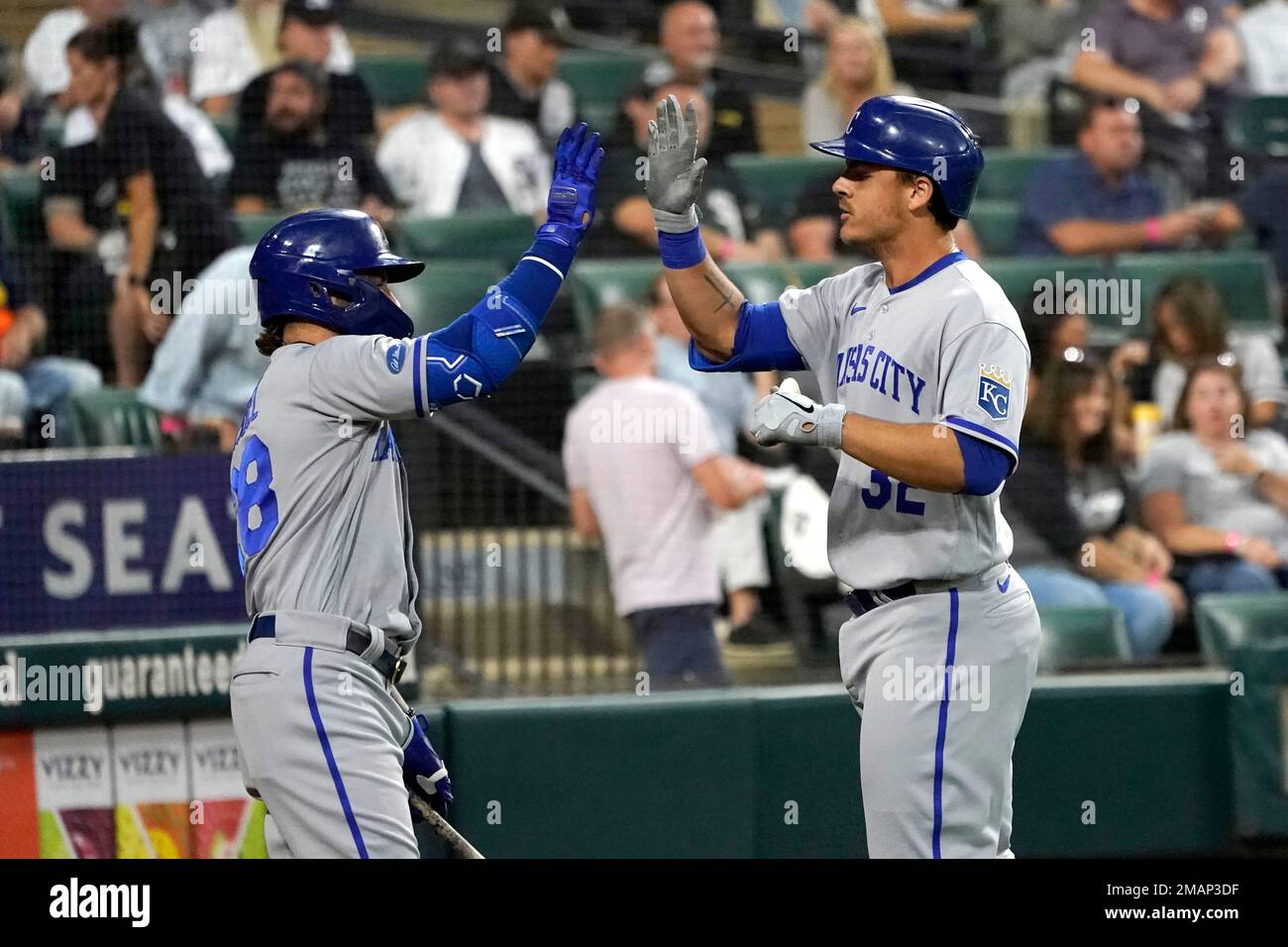 Kansas City Royals' Nick Pratto, right, is congratulated by Kyle Isbel ...