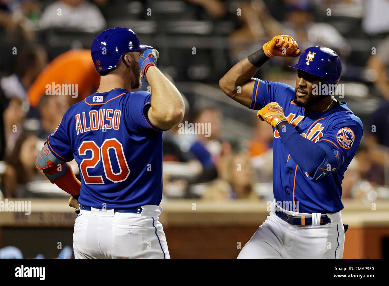 New York Mets' Starling Marte celebrates his home run during the second ...