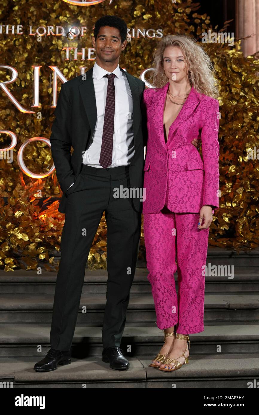 Alfred Enoch, left, and Mona Godfrey pose for photographers upon ...